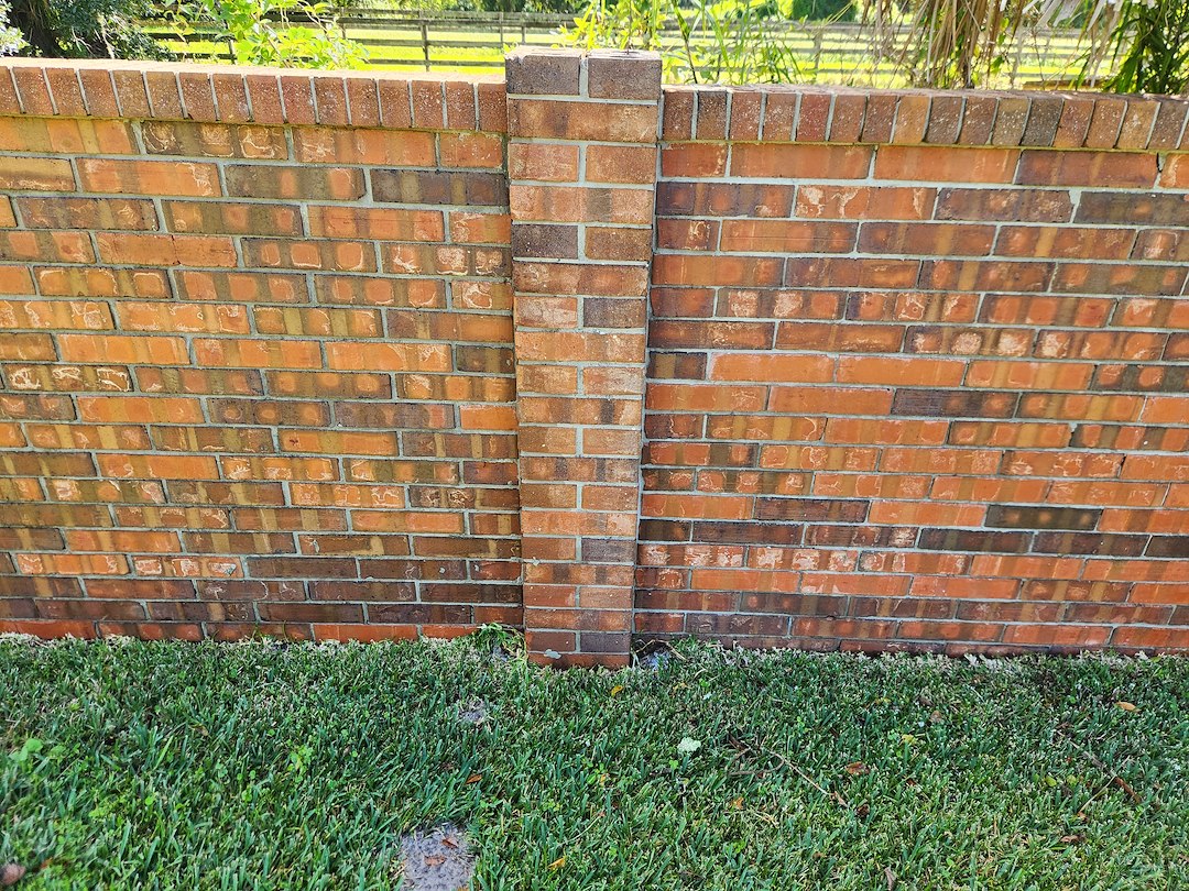 Alpine Home Services to the rescue, making this brick wall in ...